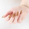 57 Gold Nail Designs for a Mani Fit for Royalty